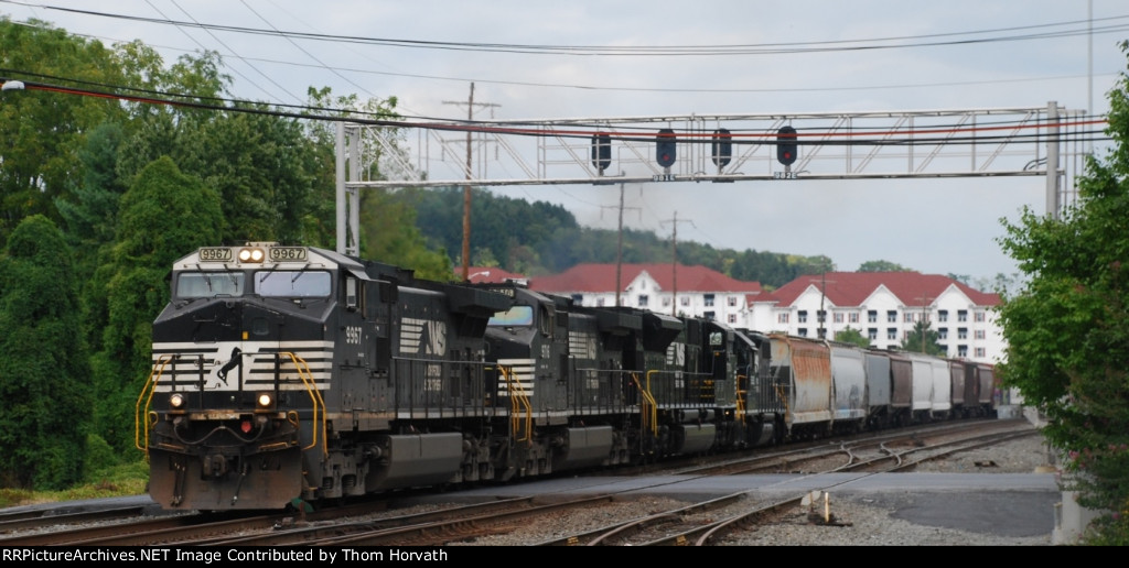 NS 9967 leads NS 19G through Derry Street's grade crossing (MP 99)
